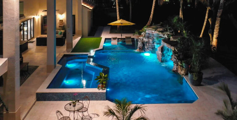 Modern Pool with Natural Rock Grotto in Miami, Florida | Lucas Lagoons
