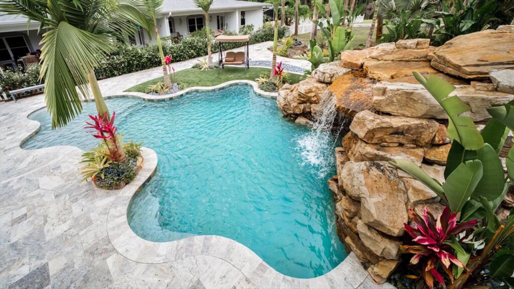 Small Tropical Pool With Large Grotto | Lucas Lagoons